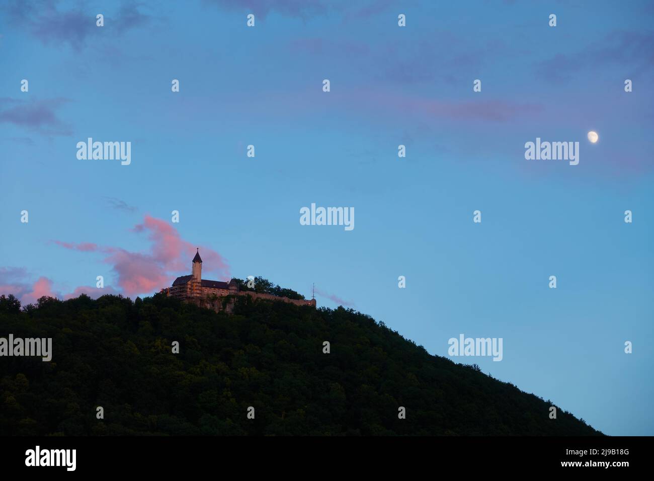 Burck Teck near Kirchheim on a green hill with trees, blue sky with ...