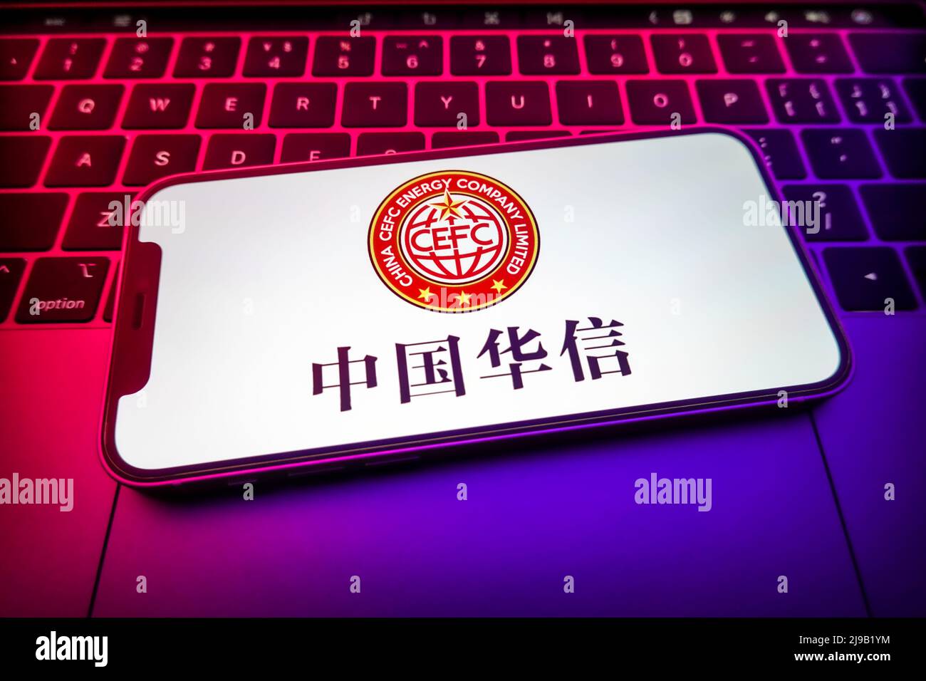 In this photo illustration, a CEFC logo is displayed on the screen of a ...