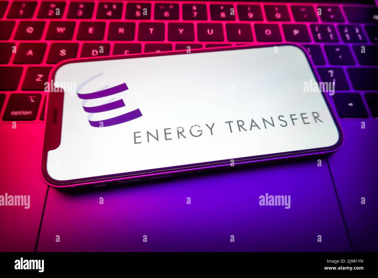 In this photo illustration, an Energy transfer logo is displayed on a ...