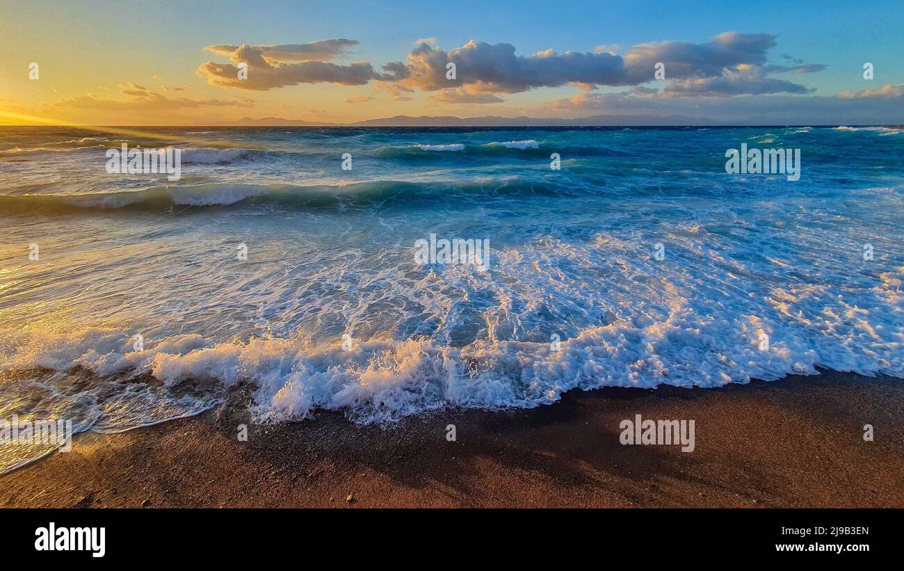 Wave at sunset hi-res stock photography and images - Alamy
