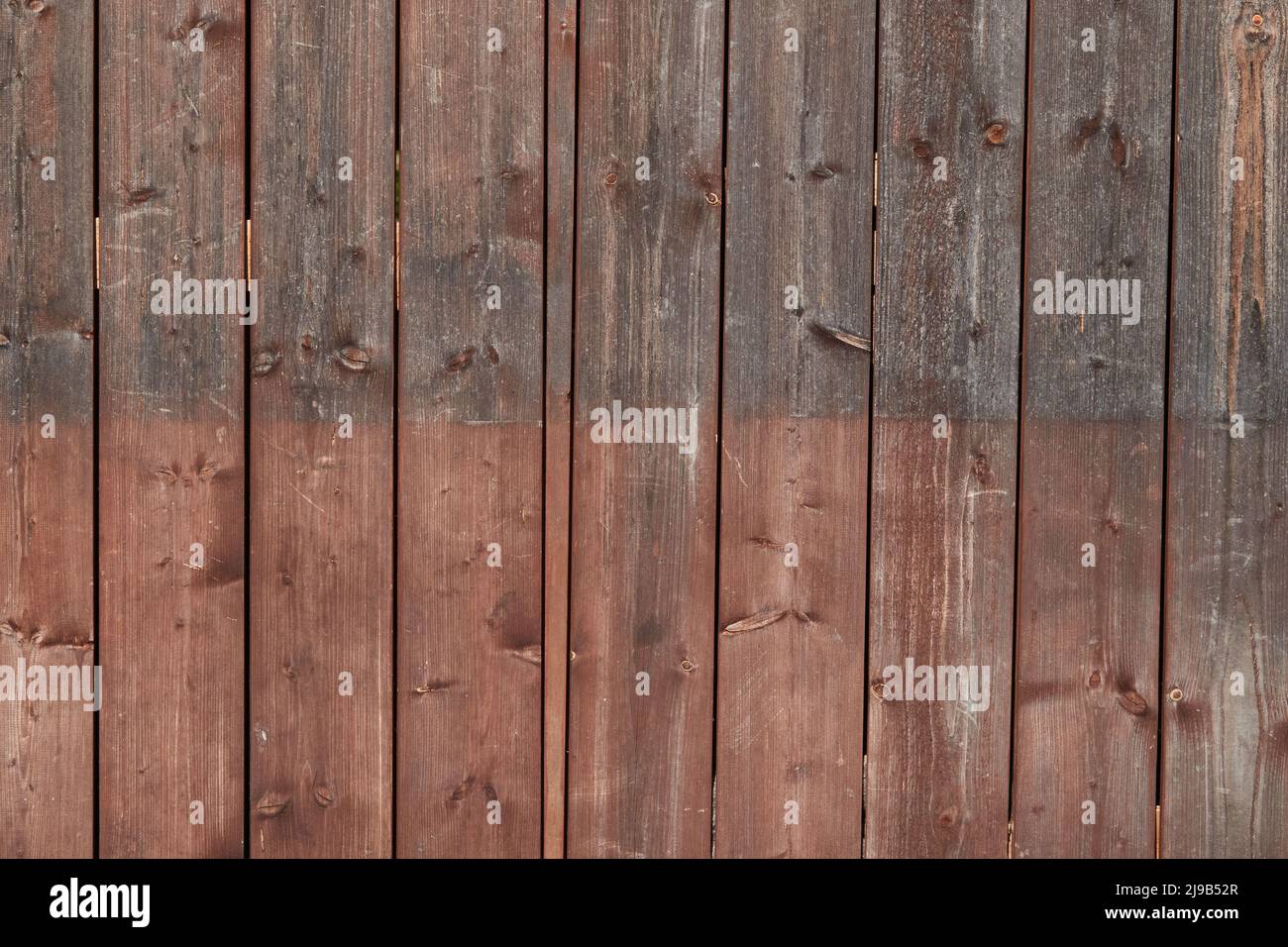 Brown wood panels from a hut in daylight. symmetrical, even. Germany ...