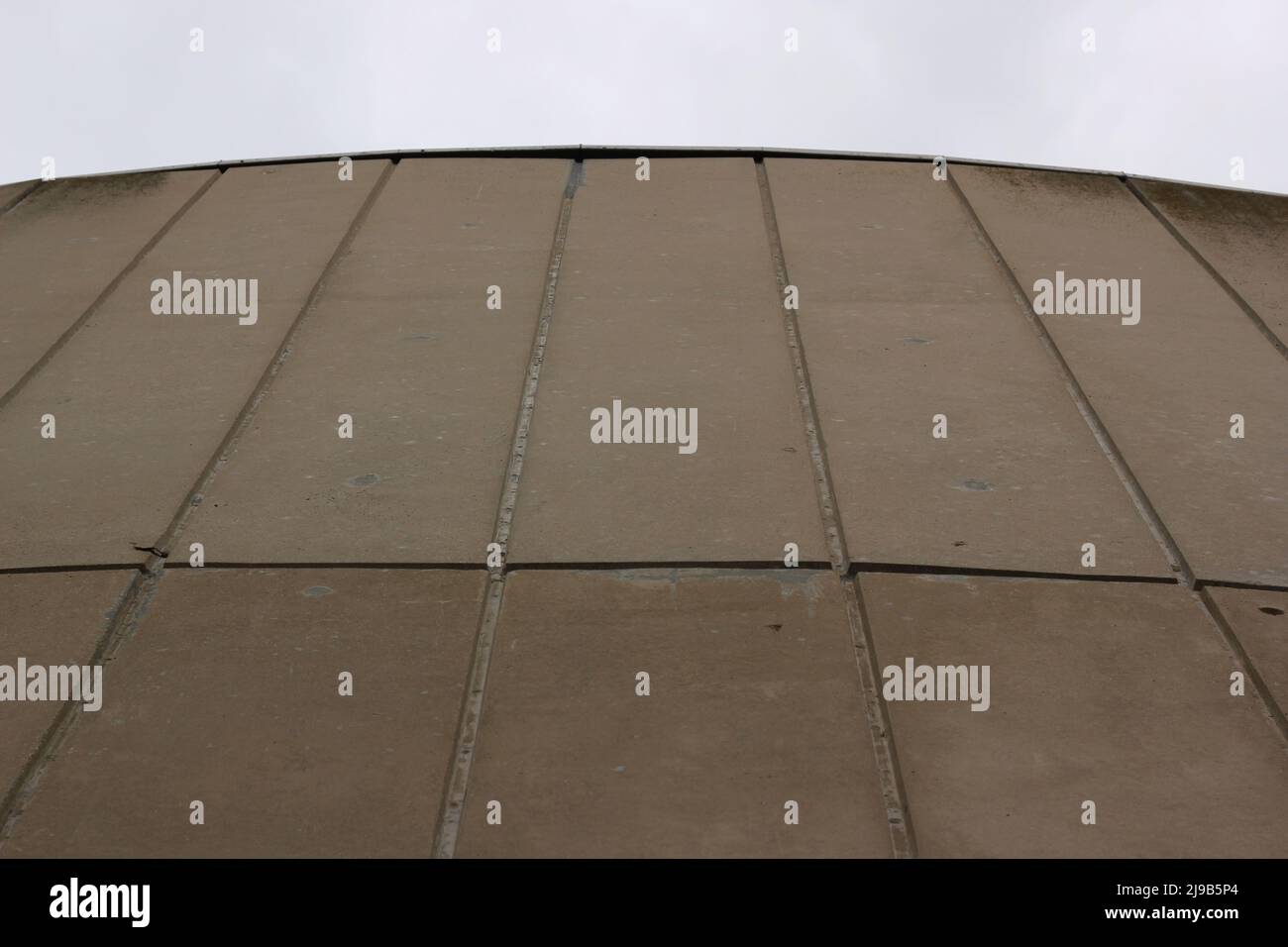 A minimalist view of a concrete panel floor with a radial pattern Stock ...