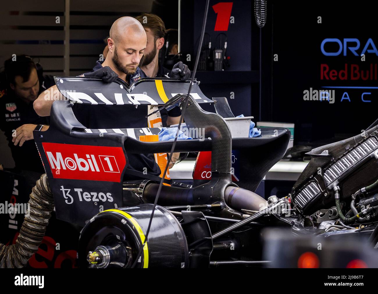 BARCELONA - Red Bull Racing engineers are working on the rear wing of ...