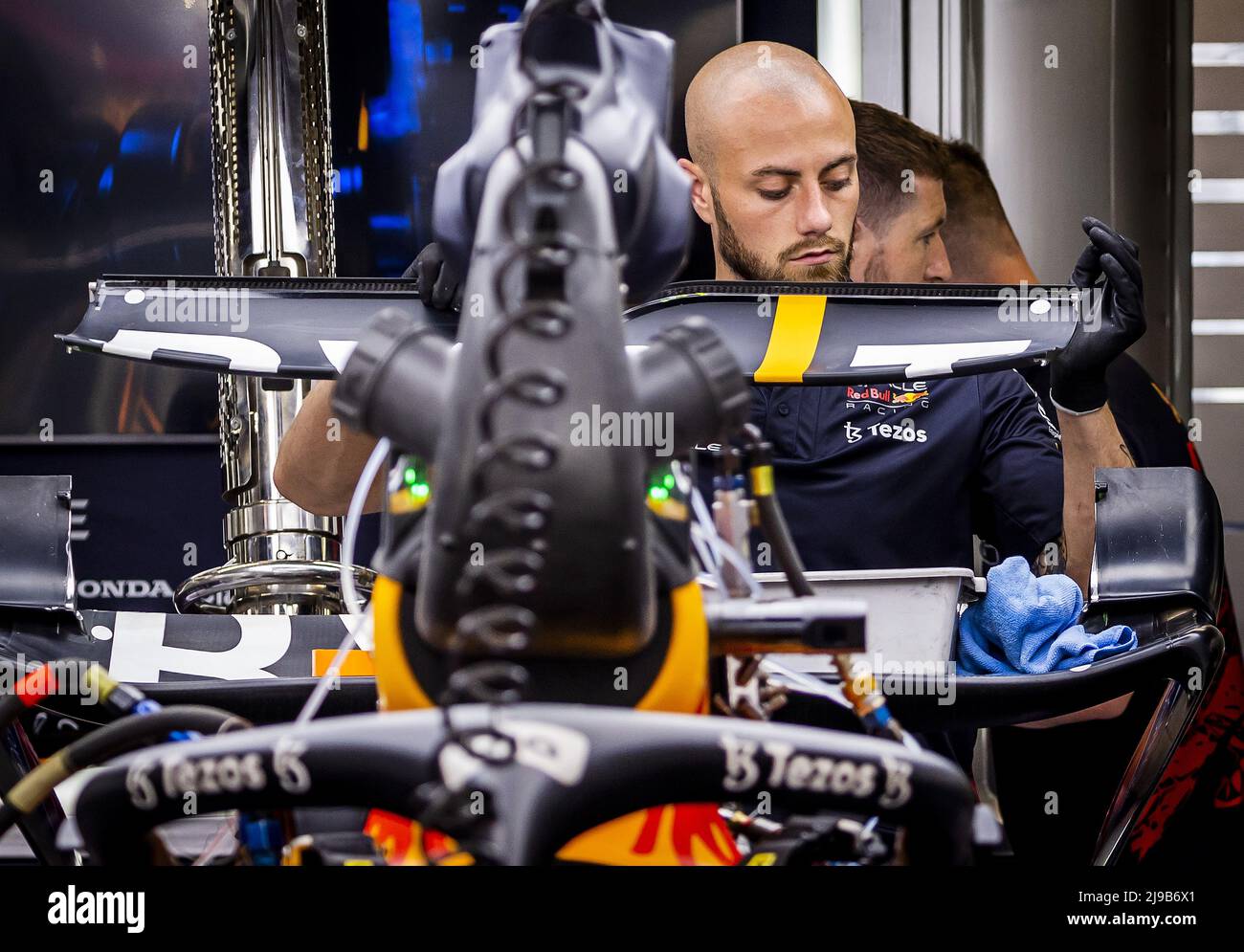 BARCELONA - Red Bull Racing engineers are working on the rear wing of ...