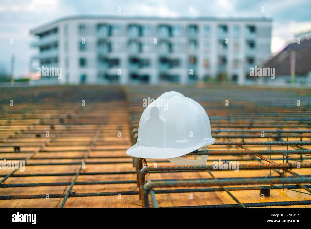 White helmet for workman as engineer or worker Stock Photo - Alamy