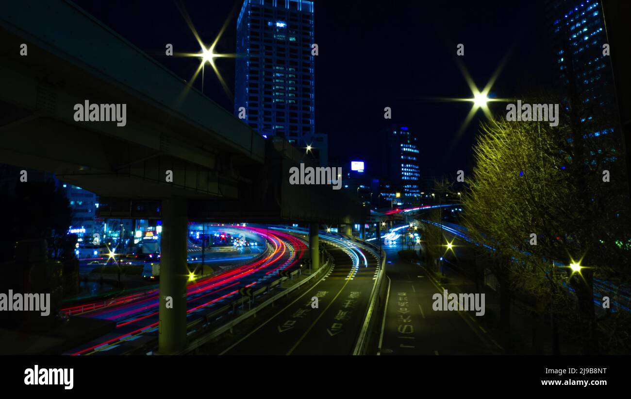 Night time lapse street at the business town in Akasaka Tokyo wide shot ...