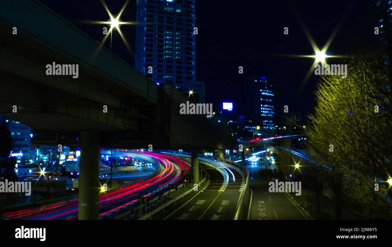 Night time lapse street at the business town in Akasaka Tokyo wide shot ...