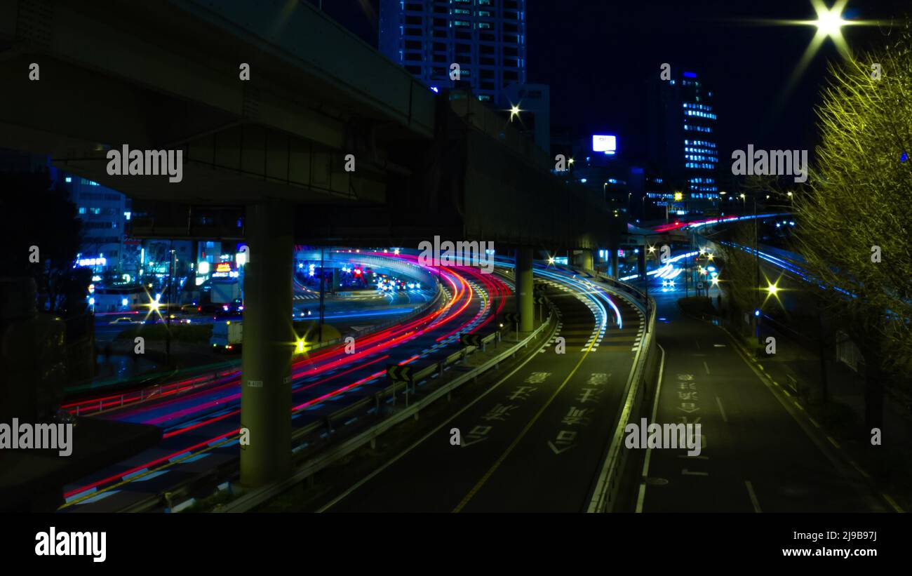 Night time lapse street at the business town in Akasaka Tokyo wide shot ...