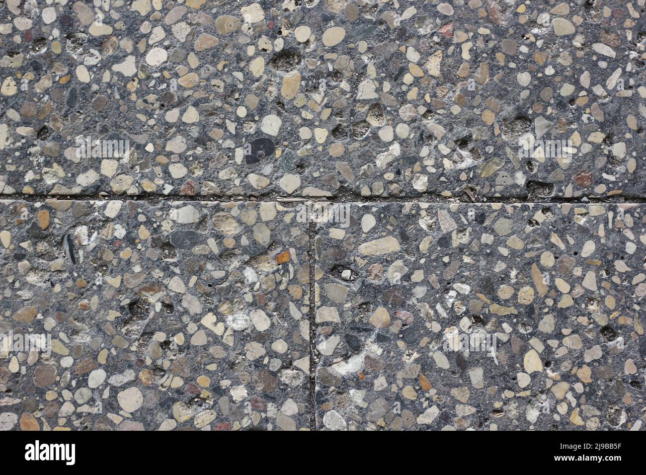 Full frame of contemporary floor material with gravel rocks and stones ...