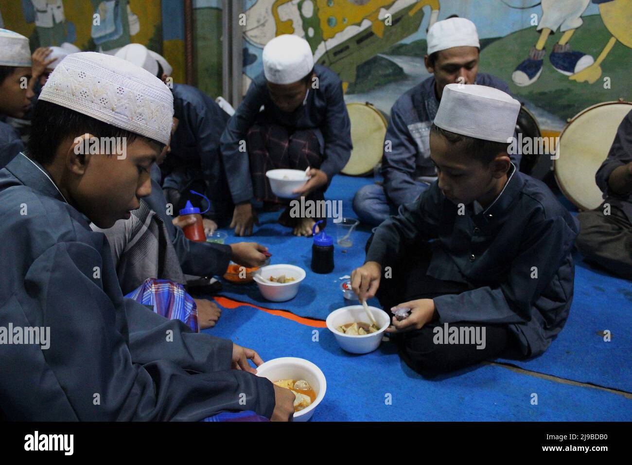 Jakarta, Indonesia - 05 26 2019: Muslim children eating meatballs ...