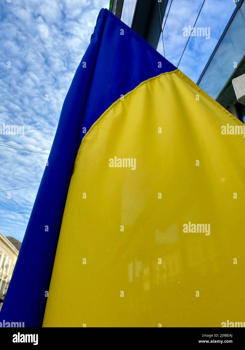 Ukrainian flag on the facade of an old building in Lviv Stock Photo - Alamy