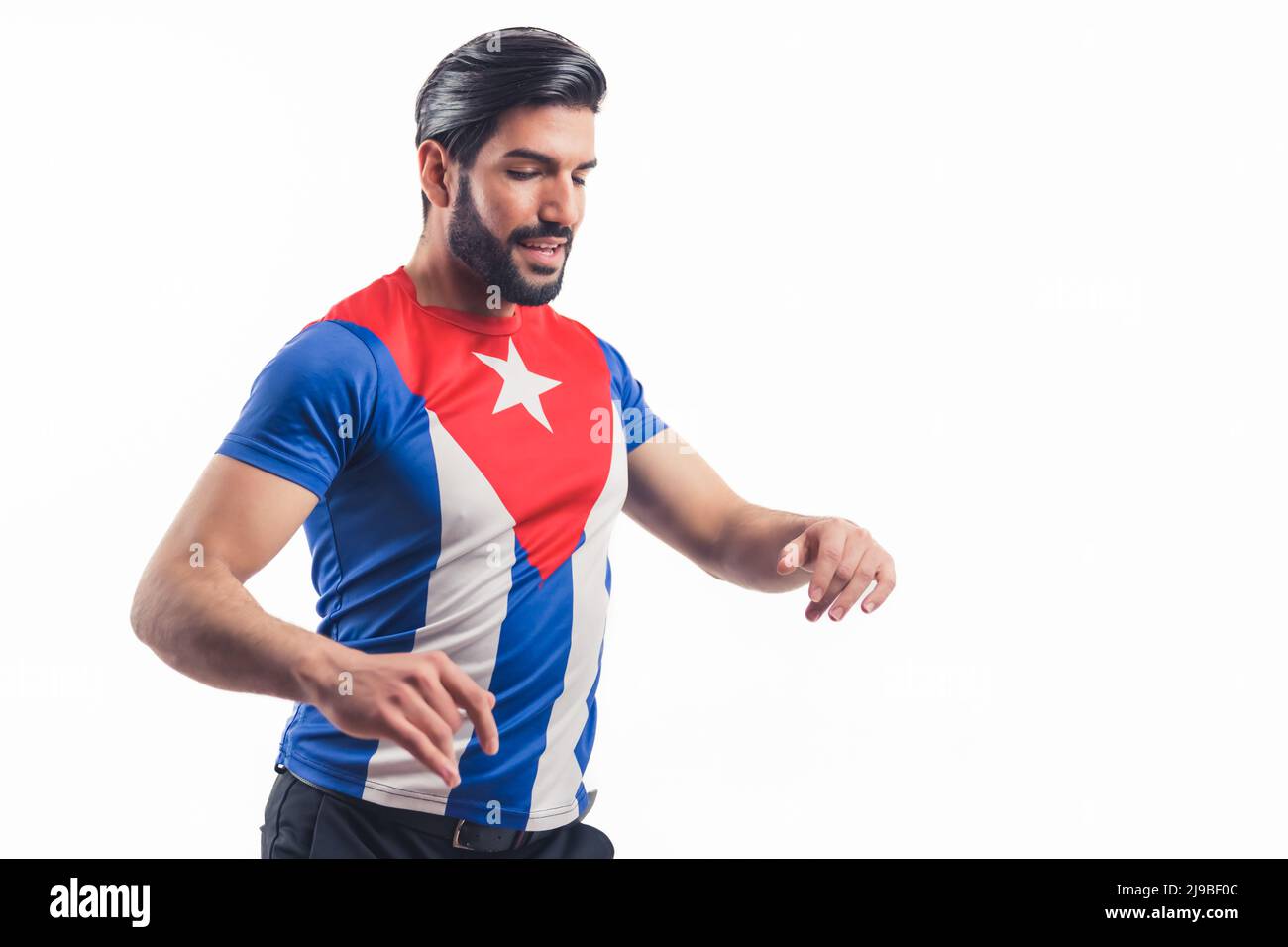 Handsome Latin American man dancing rumba , studio isolated white ...