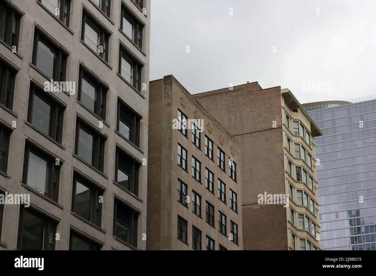 A tall skyscraper in downtown Chicago with lots of windows Stock Photo ...