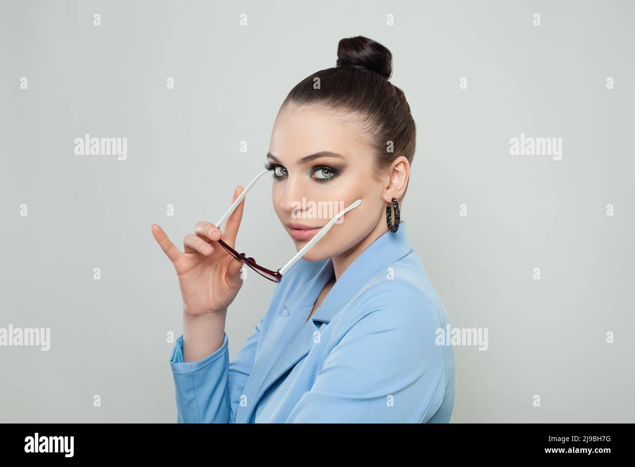 Fashion model woman with glasses portrait Stock Photo - Alamy