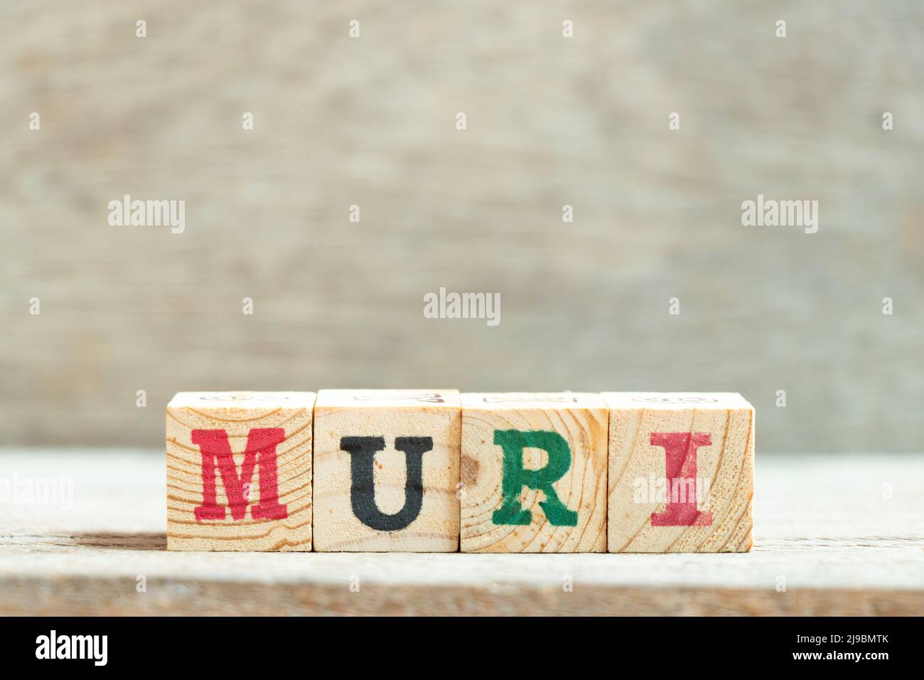 Alphabet letter block in word muri on wood background Stock Photo - Alamy