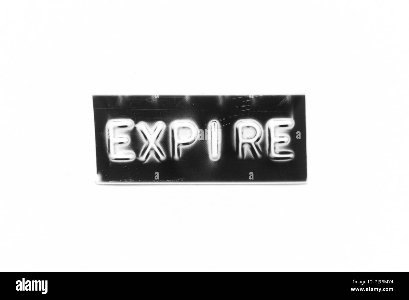 Black color banner that have embossed letter with word expire on white ...