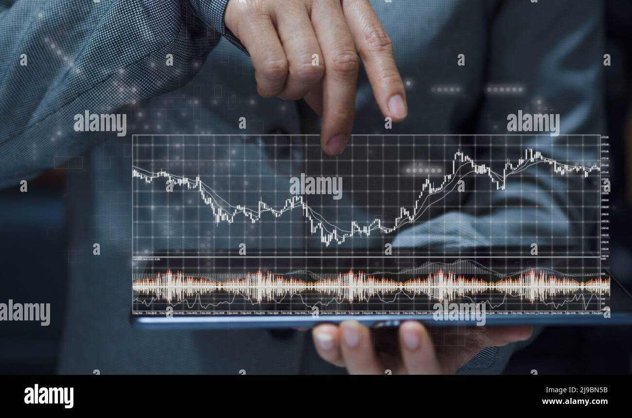 Business woman holding smart device with stock chart, investing in ...