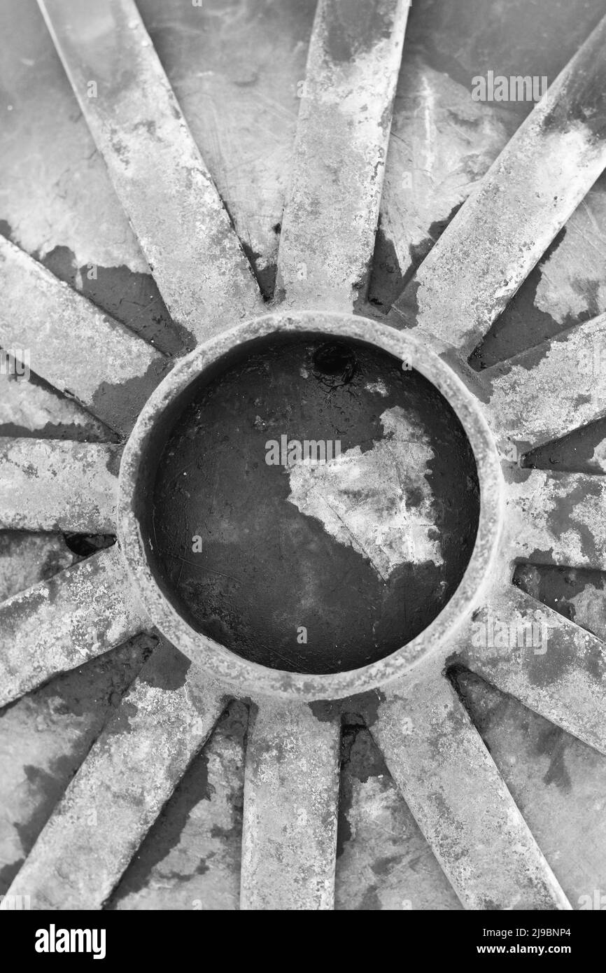 Radial pattern in strong industrial steel metal in black and white ...