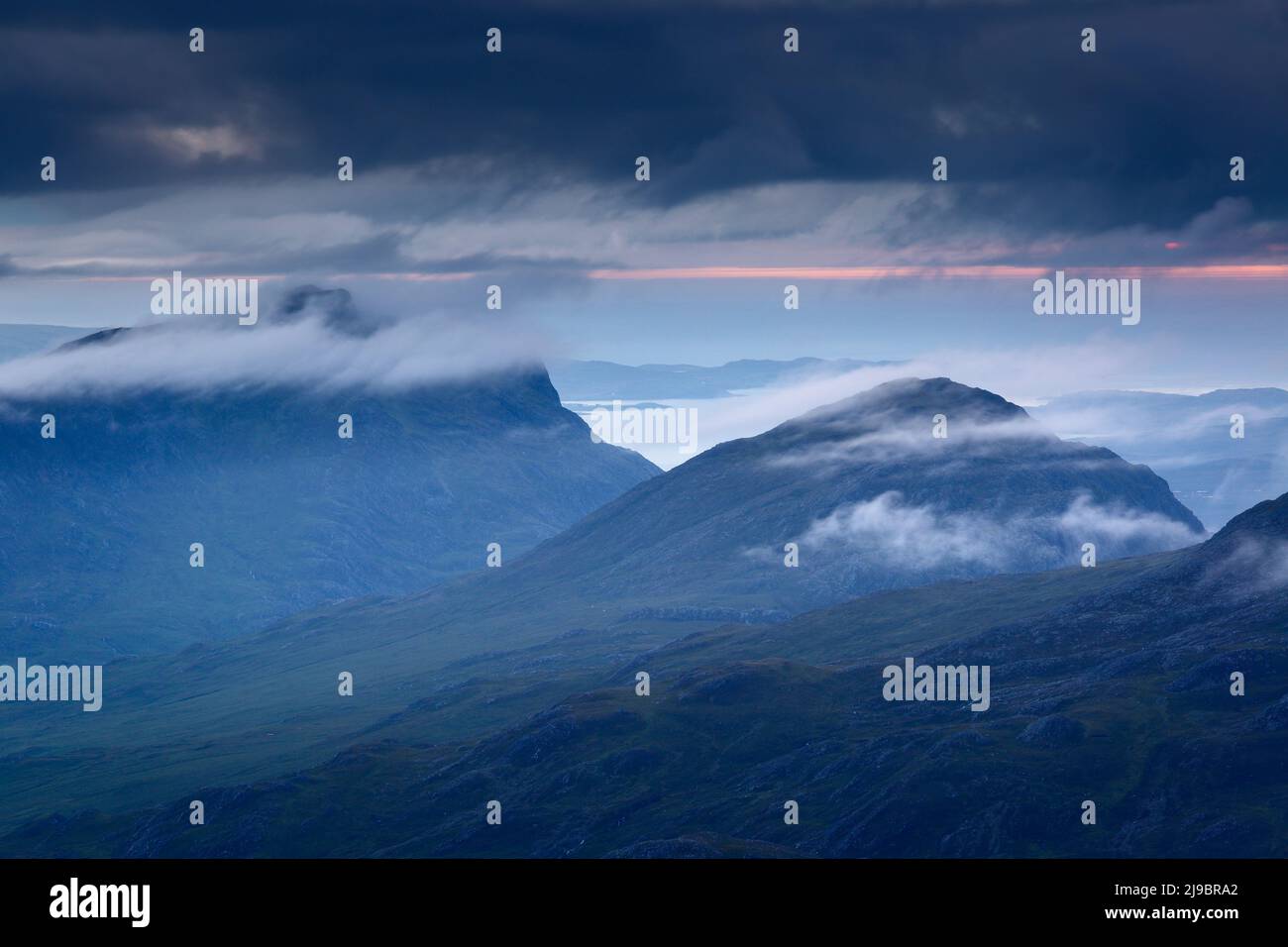 Beinn Lair and Beinn Airigh Charr from Slioch, Torridon at dusk Stock ...