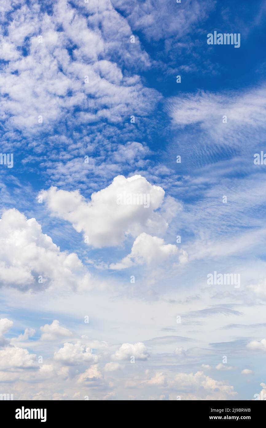 The Blue sky with scattered clouds Stock Photo - Alamy