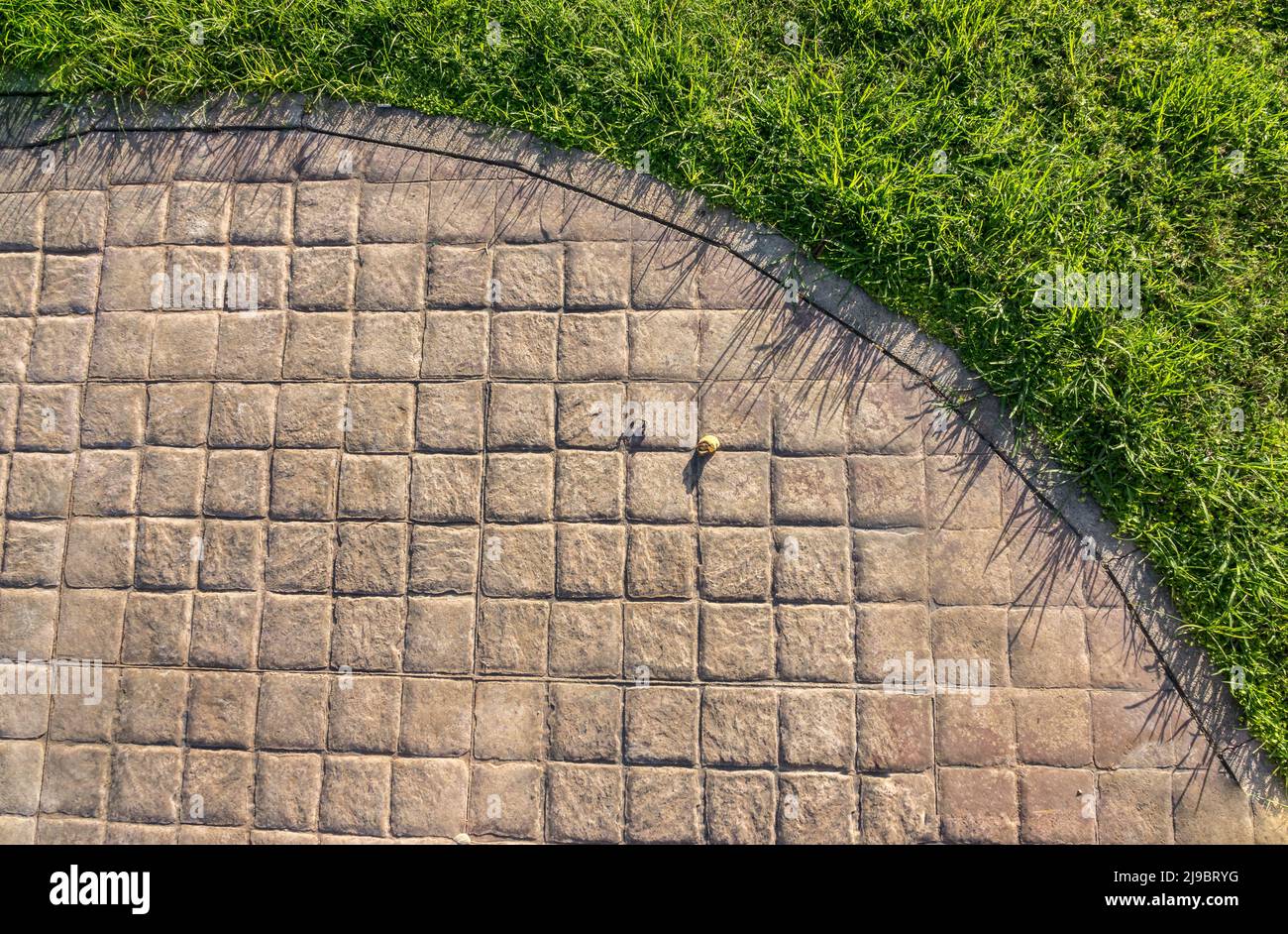 Stamped concrete pavement cobblestones pattern, decorative paving ...