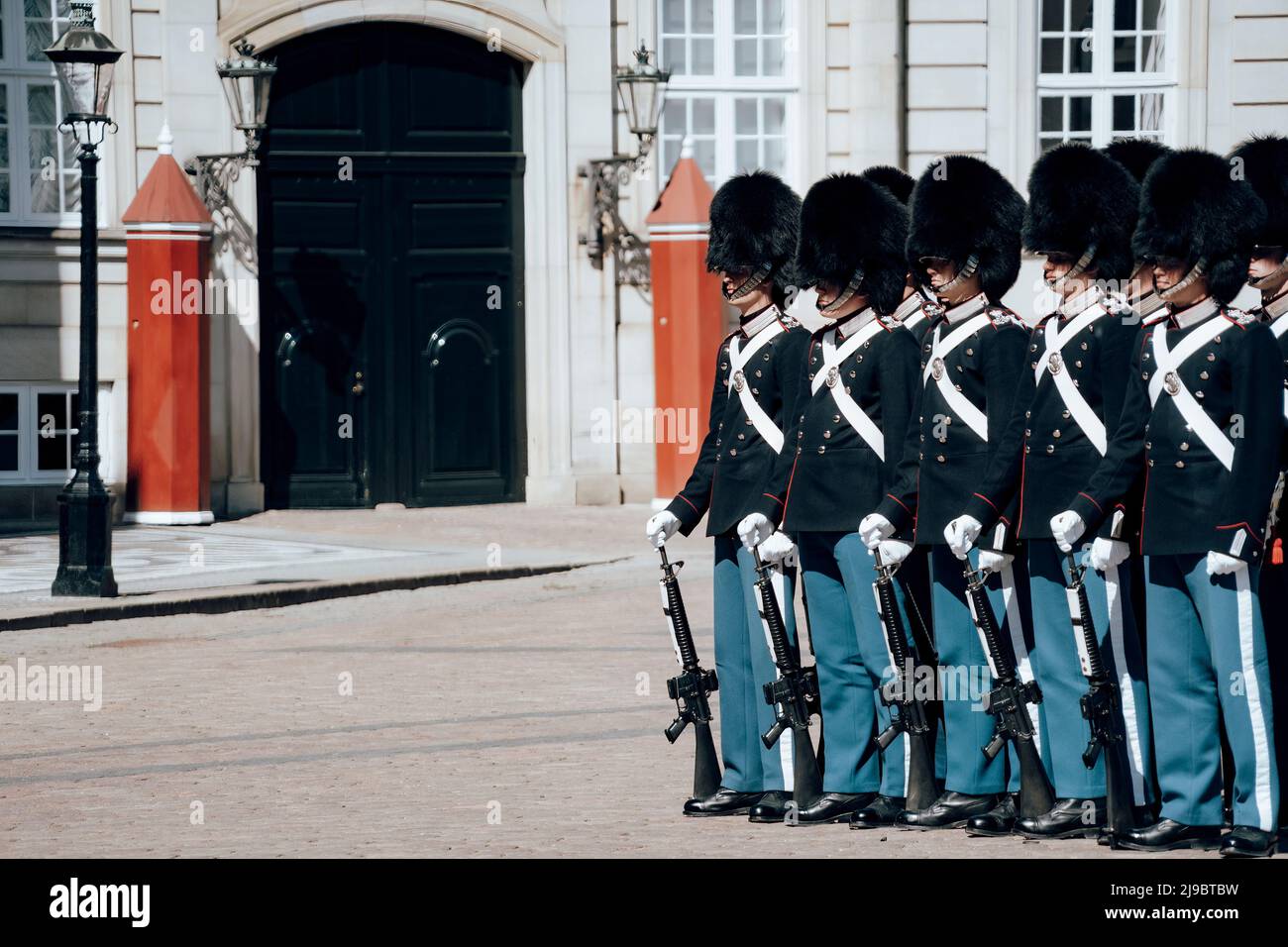 Royal Guard in Amalienborg Castle in Copenhagen in Denmark Stock Photo ...