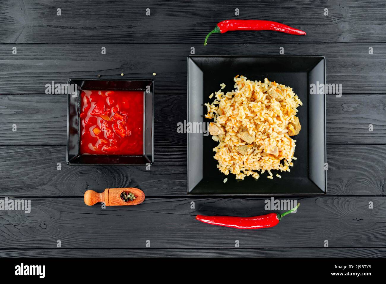 Traditional Asian dish - rice pilaf, vegetables and meat in a plate on ...