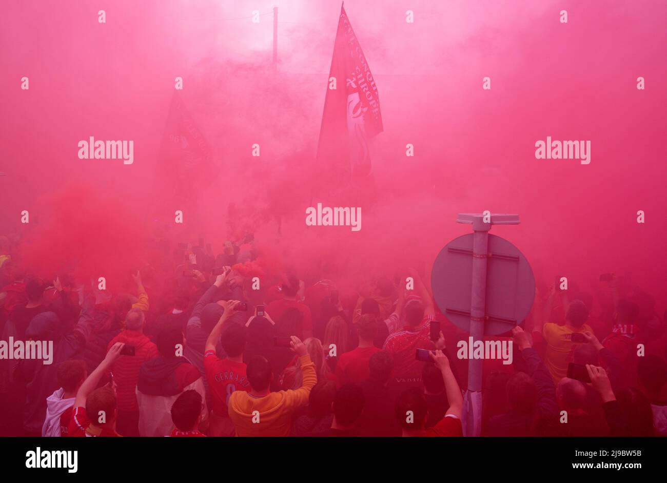 Liverpool fans light flares as they gather outside the ground prior to ...