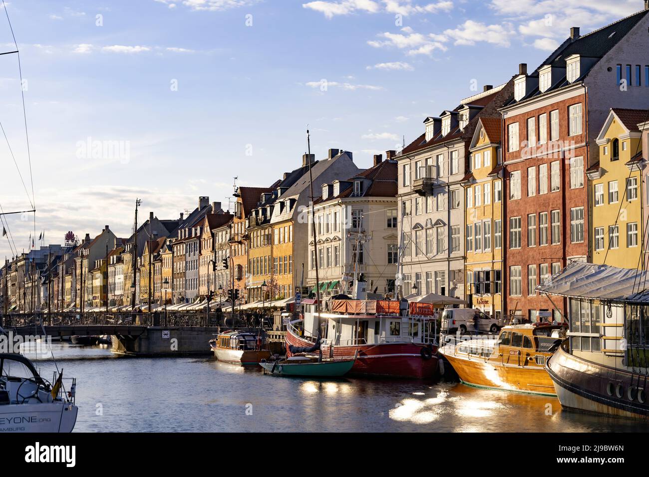 Nyhavn district is one of the most famous landmark in Copenhagen in a ...