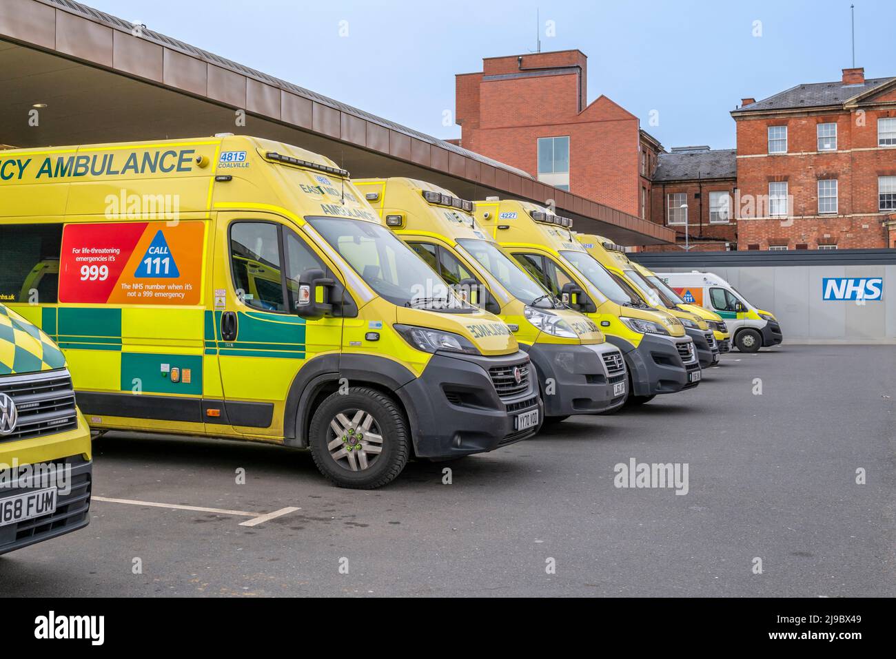 A row of ambulances ready to be dispatched Stock Photo - Alamy