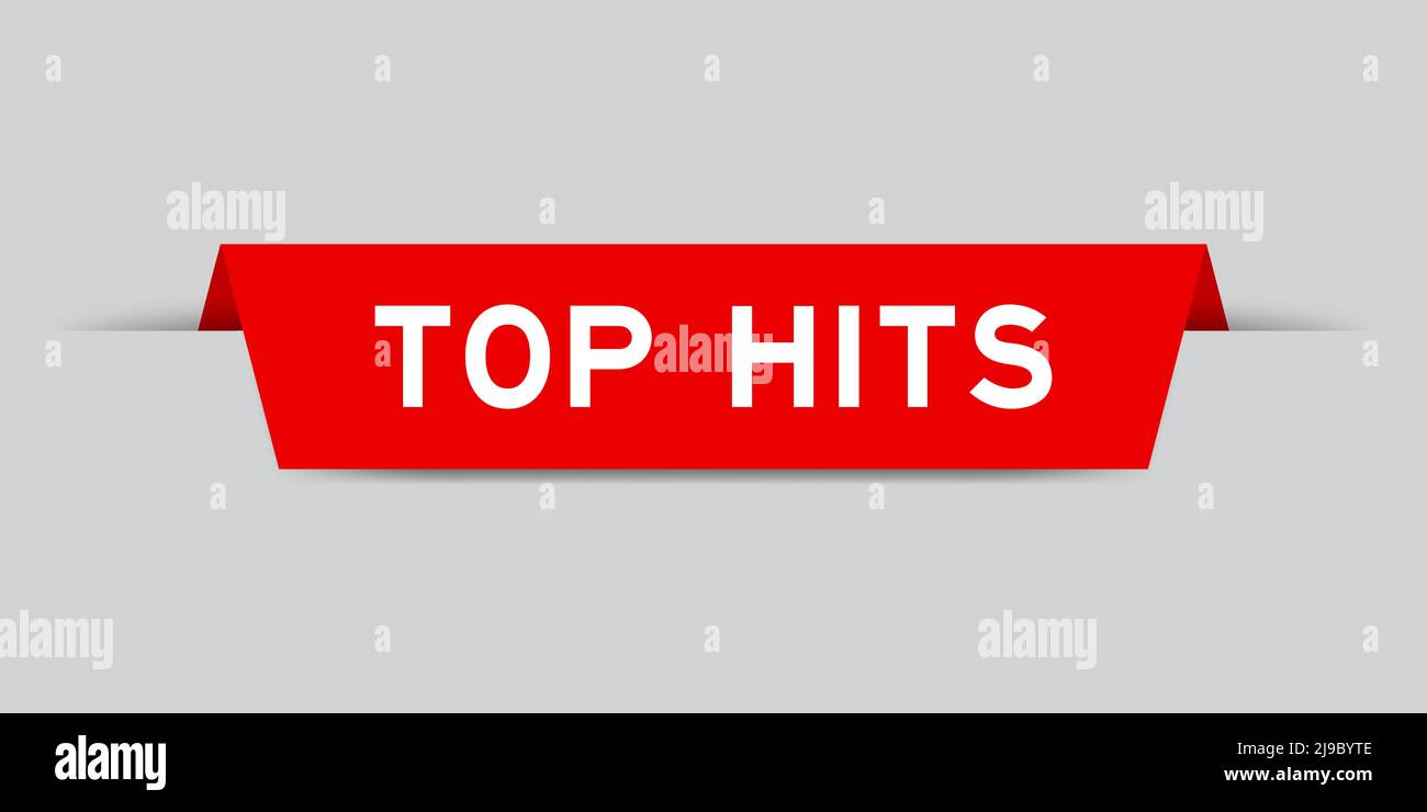 Red color inserted label with word top hits on gray background Stock ...