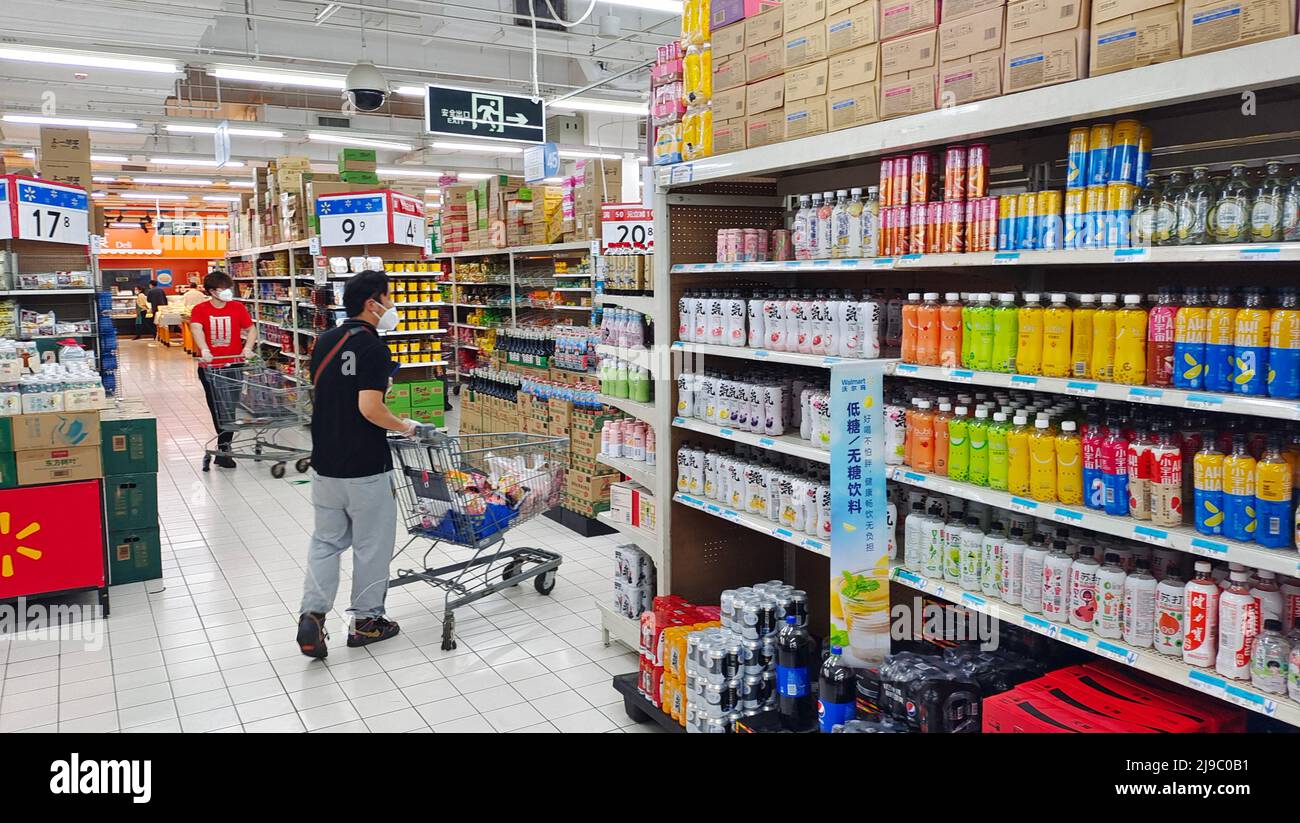 SHANGHAI, CHINA - MAY 21, 2022 - Citizens shop at a newly reopened Wal ...