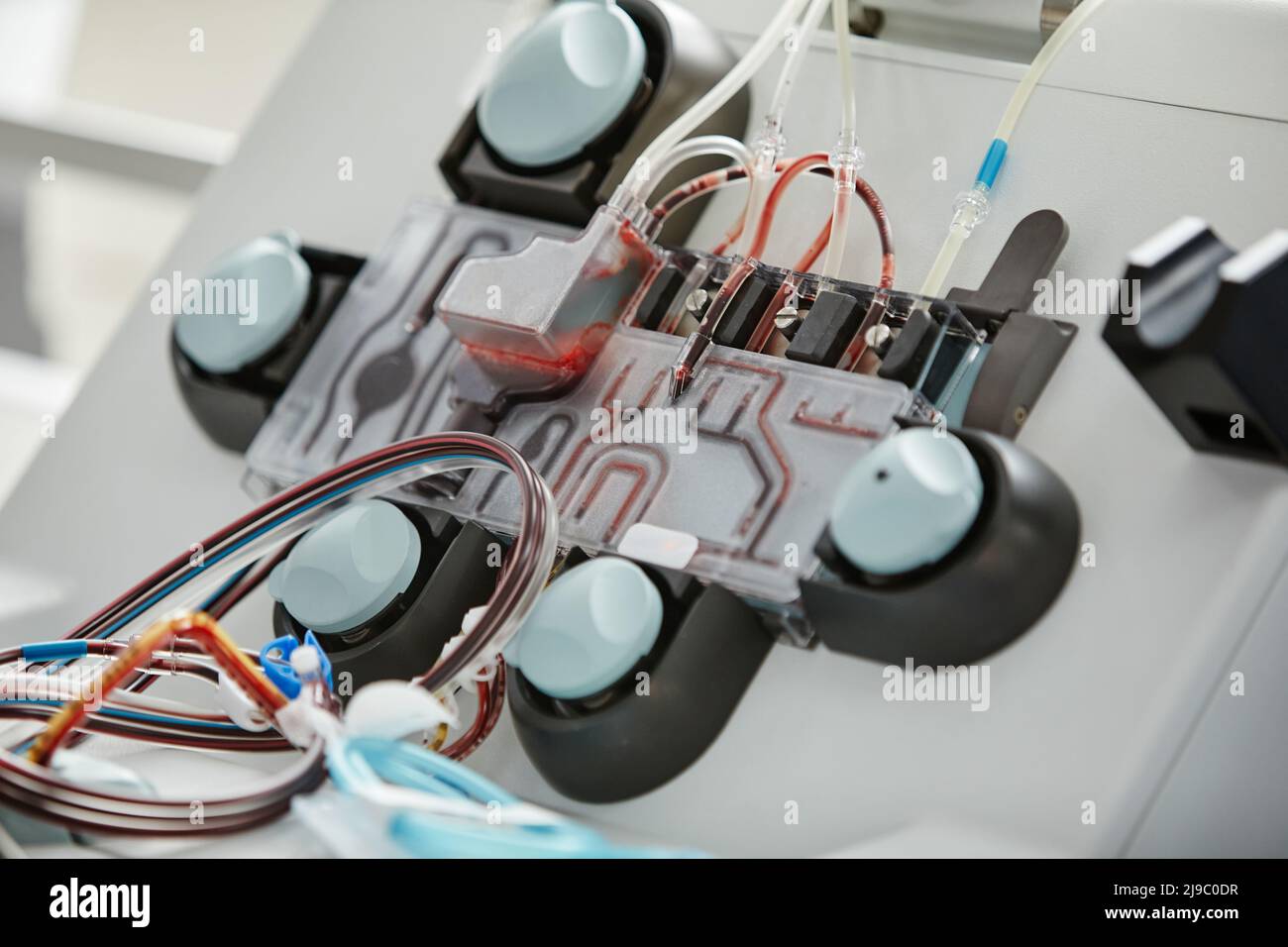Close up of medical tubes in blood transfusion machine at donor center ...