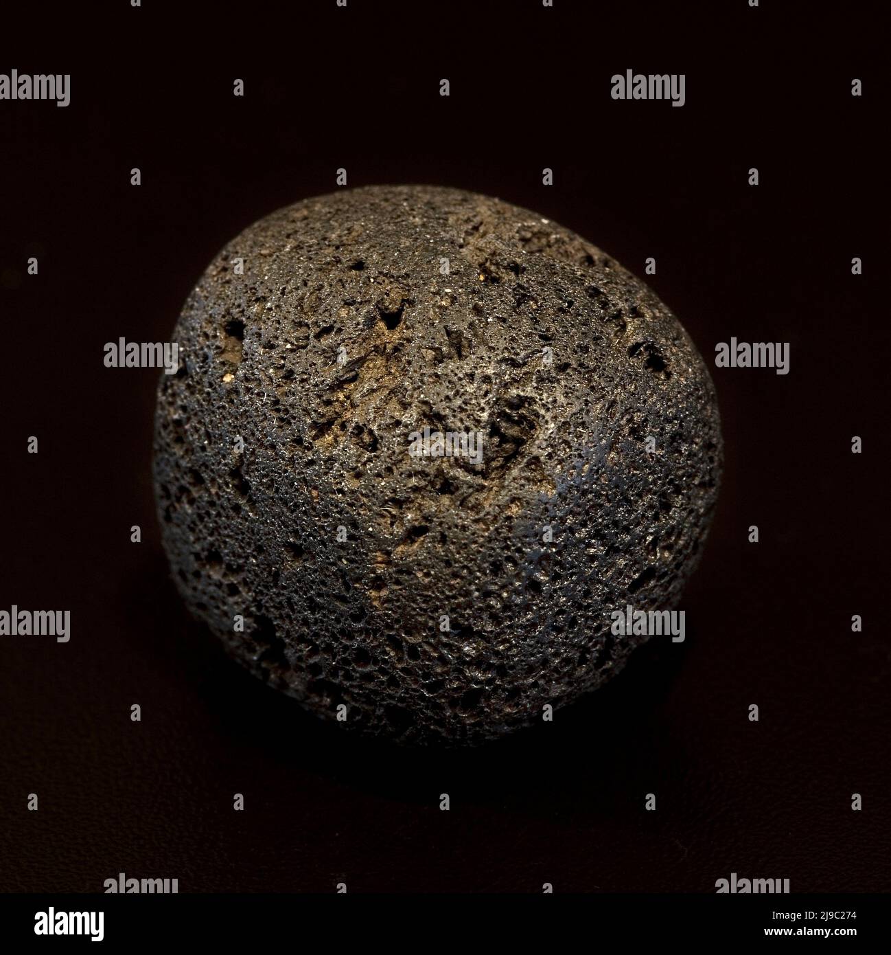 Macro close up colour photograph of a polished 'Lava Rock' a semi ...