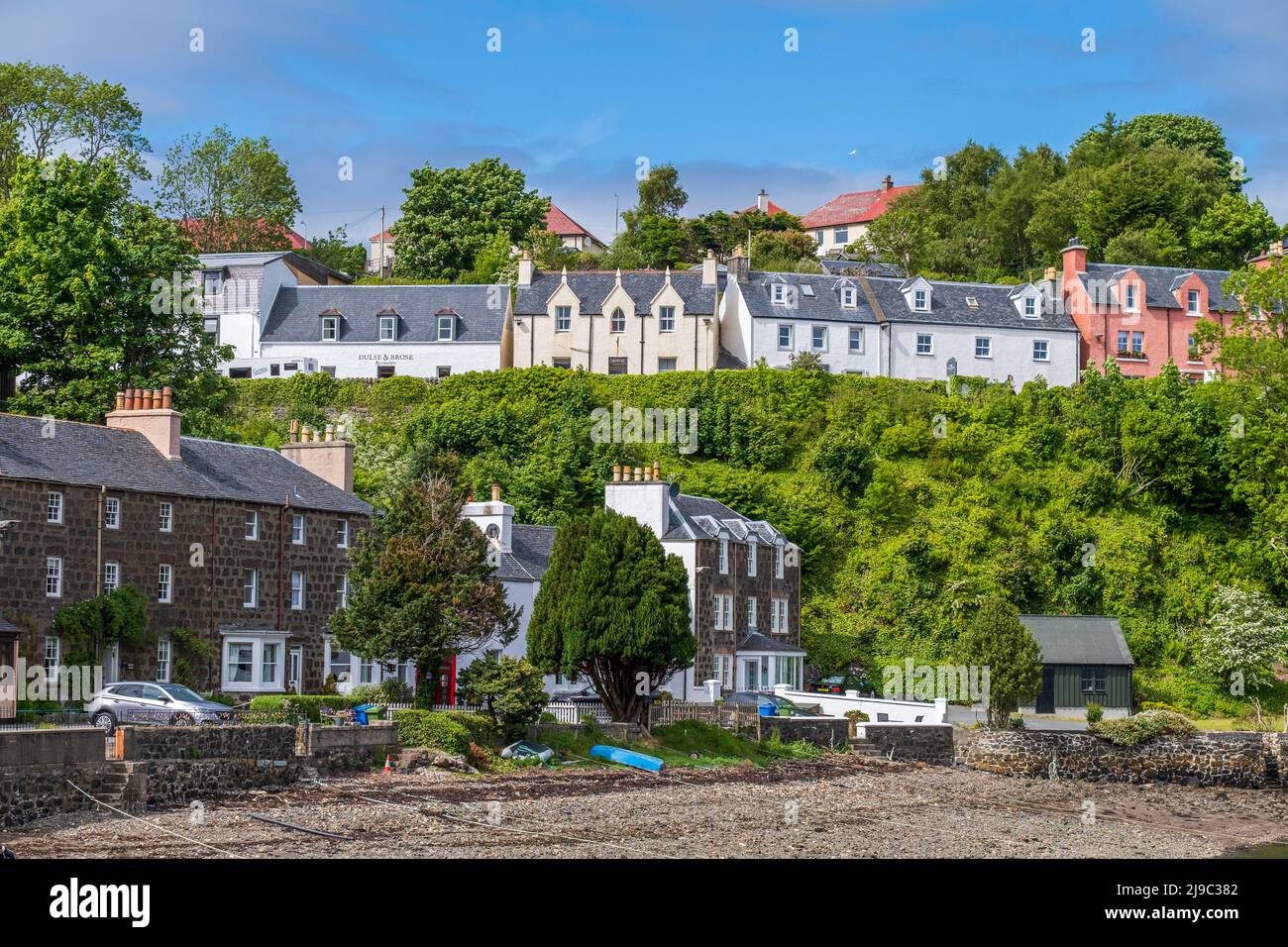 The beautiful harbour of Portree in Isle of Skye during summer Stock ...