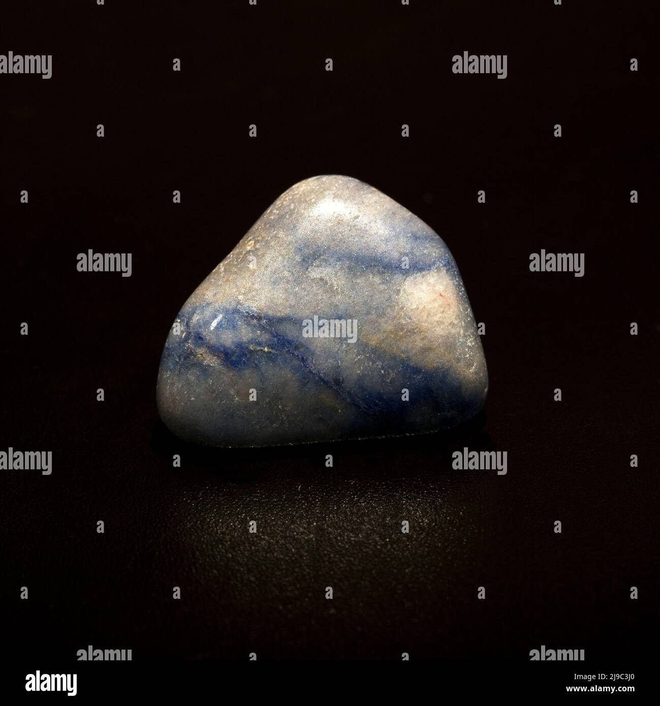 Macro close up colour photograph of 'Blue Quartz' a semi precious ...