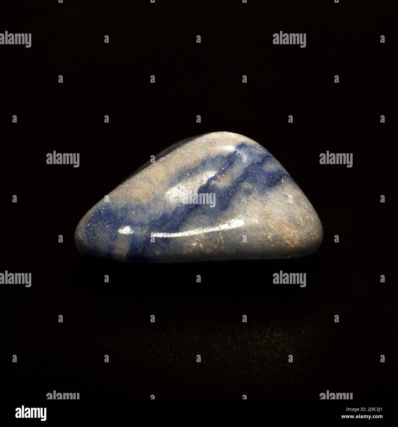 Macro close up colour photograph of 'Blue Quartz' a semi precious ...