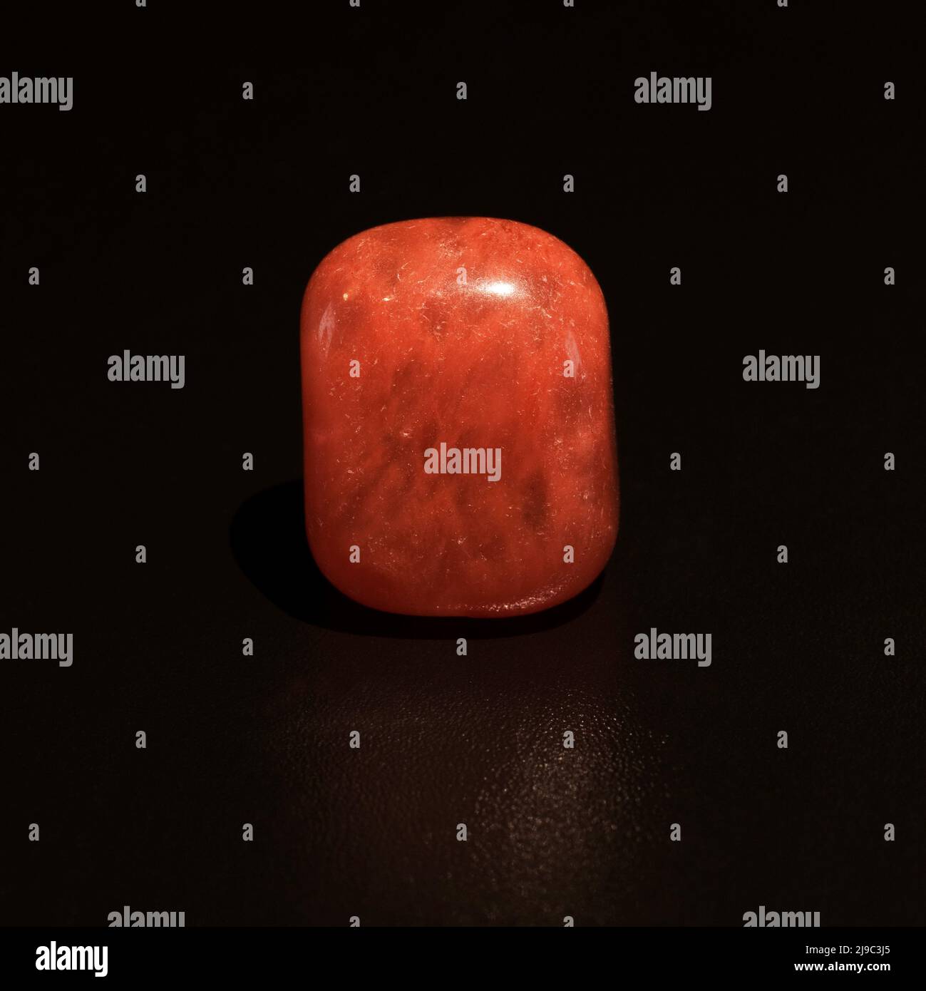 Macro close up colour photograph of 'Cherry Quartz' a semi precious ...