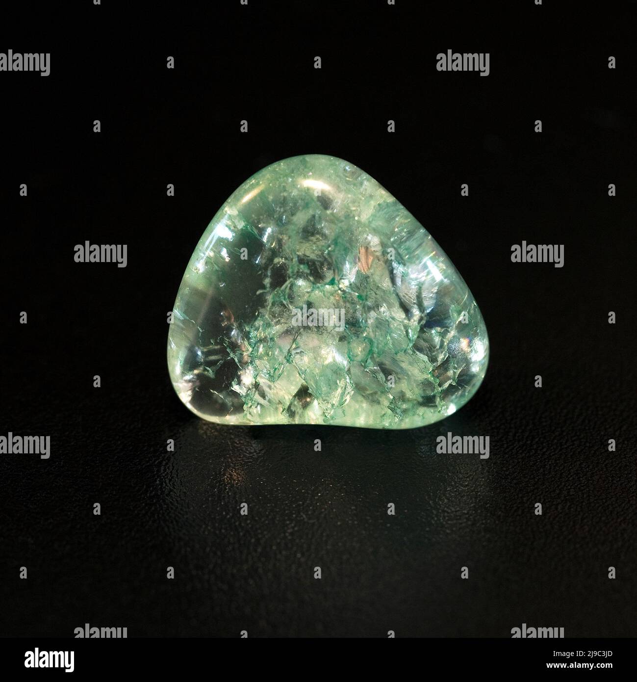 Macro close up colour photograph of 'Green Crackle Quartz' a semi ...