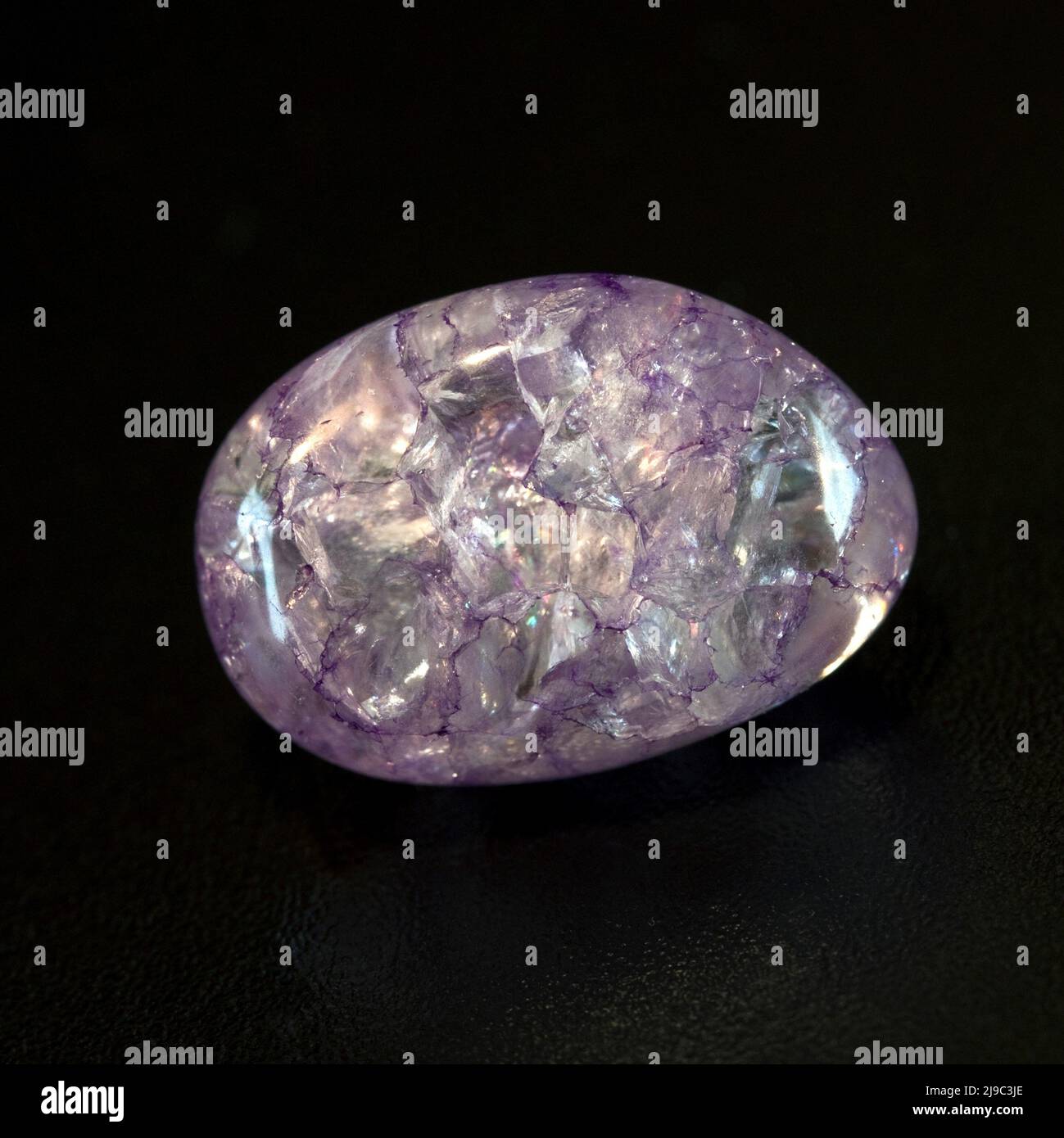 Macro close up colour photograph of 'Lavender Crackle Quartz' a semi ...