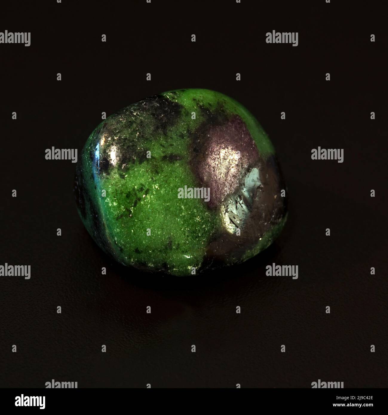 Macro close up colour photograph of 'Ruby Zoisite' a semi precious ...
