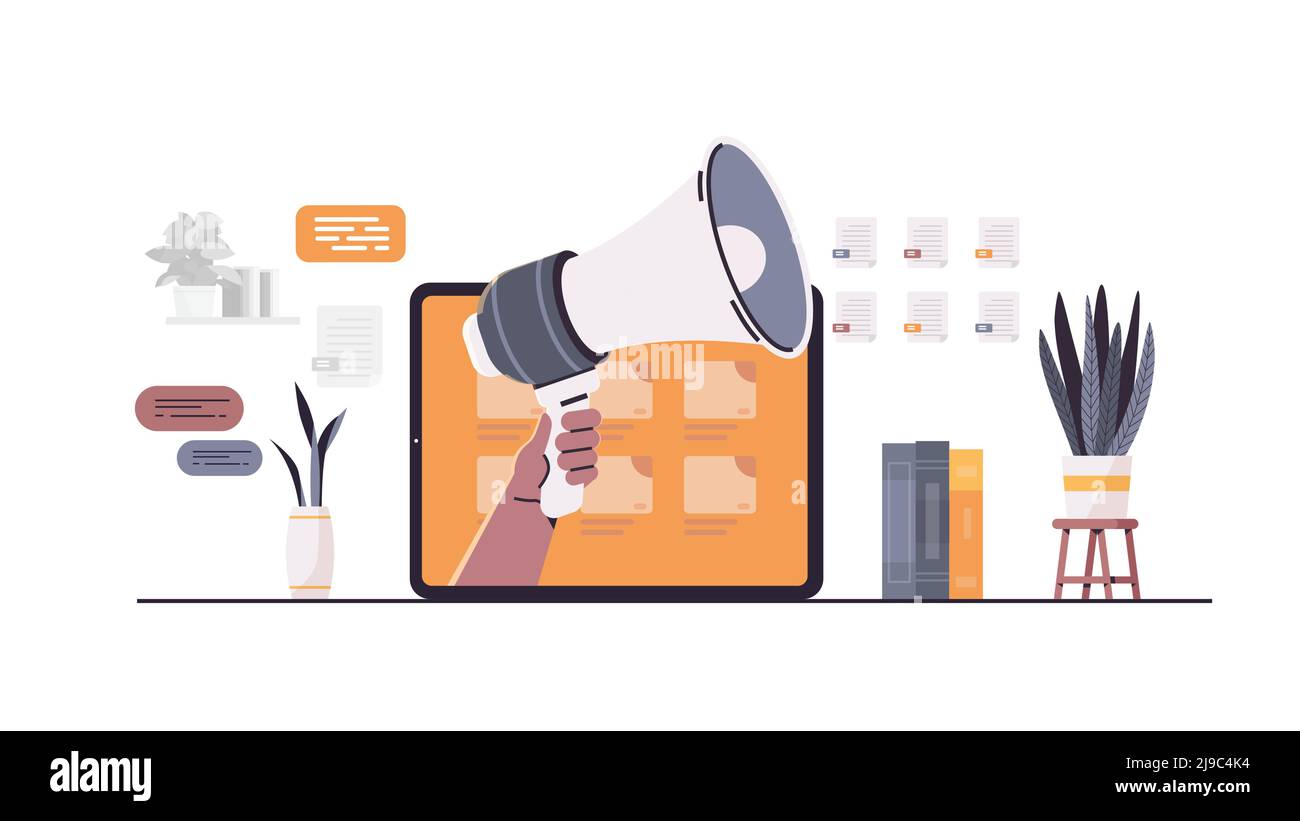 human hand holding loudspeaker on laptop screen announcement digital ...