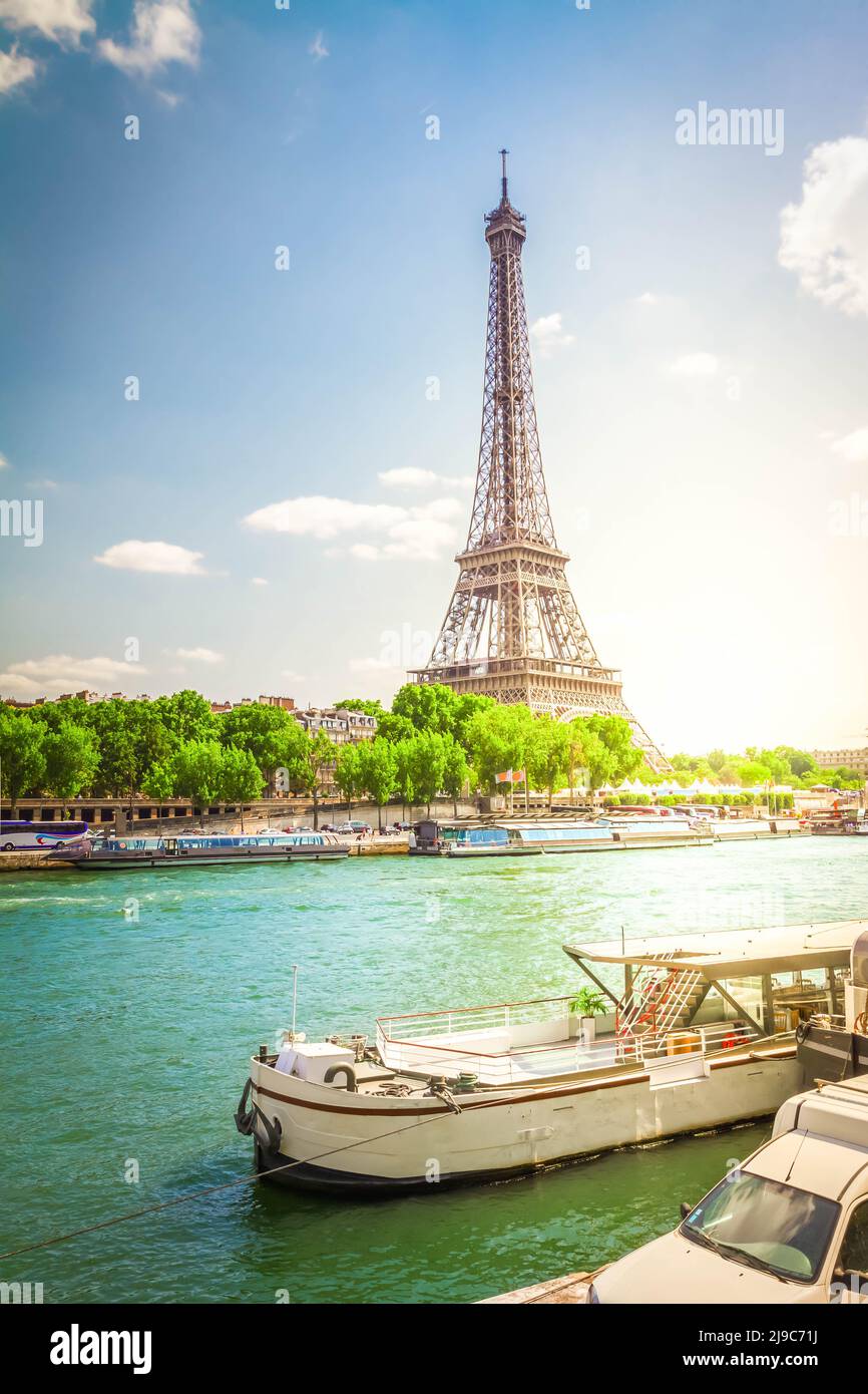 eiffel tower over Seine river Stock Photo - Alamy