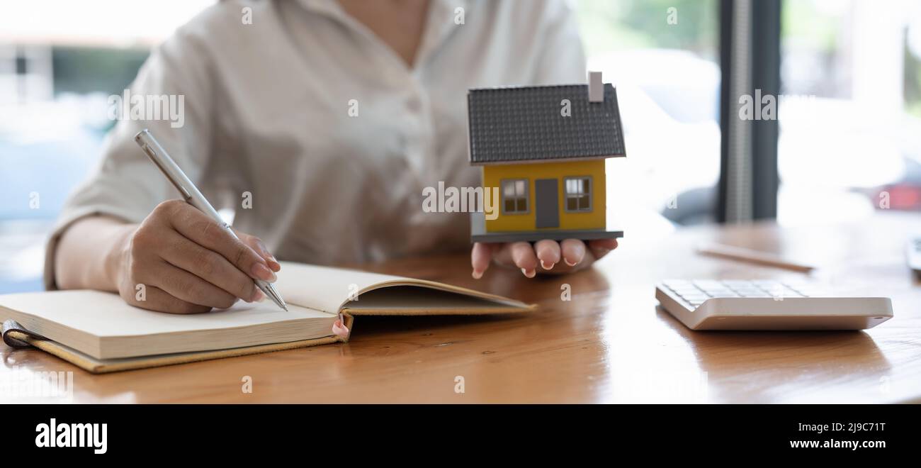 Real estate agent calculator hi-res stock photography and images - Alamy