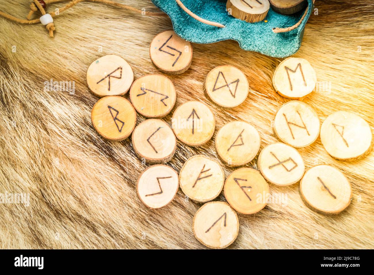 Handmade runes for fortunetelling Stock Photo - Alamy