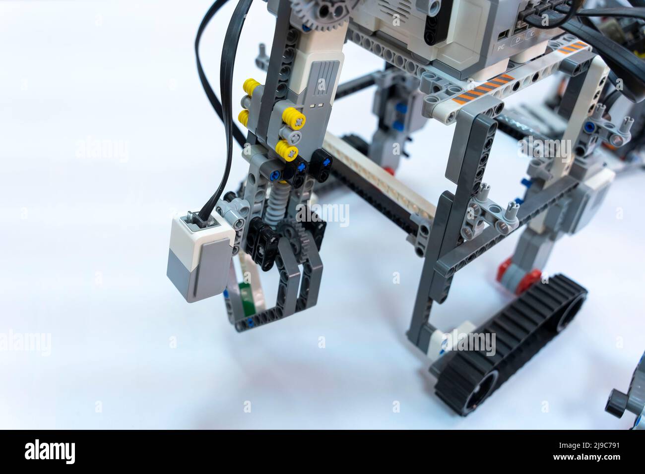 programmable children's robot with grippers on a crawler platform Stock ...