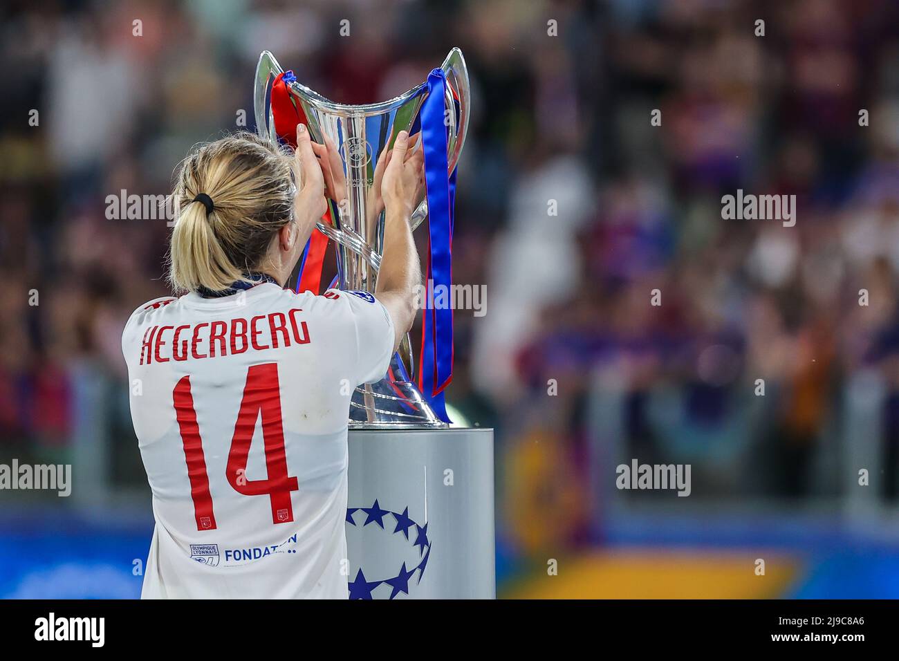 Ada Hegerberg of Olympique Lyonnais celebrates with a trophy during the ...