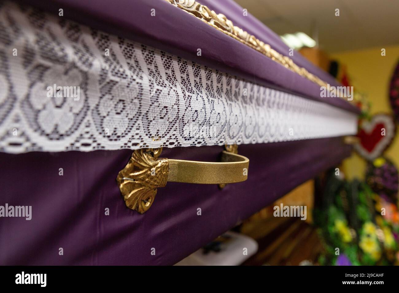 Interior of room with funeral accessories. Shop selling coffins ...