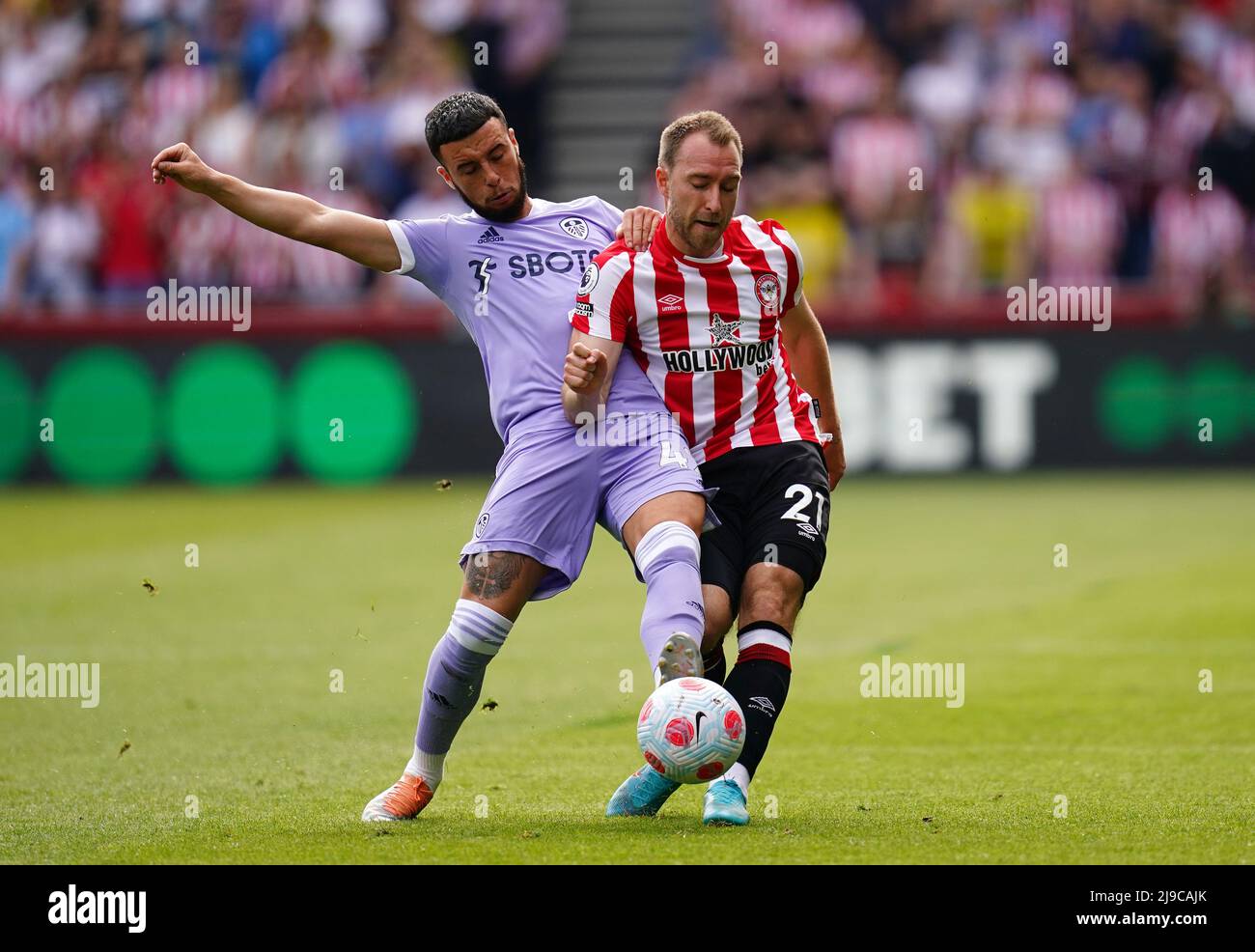 Leeds United's Sam Greenwood (left) and Brentford's Christian Eriksen ...