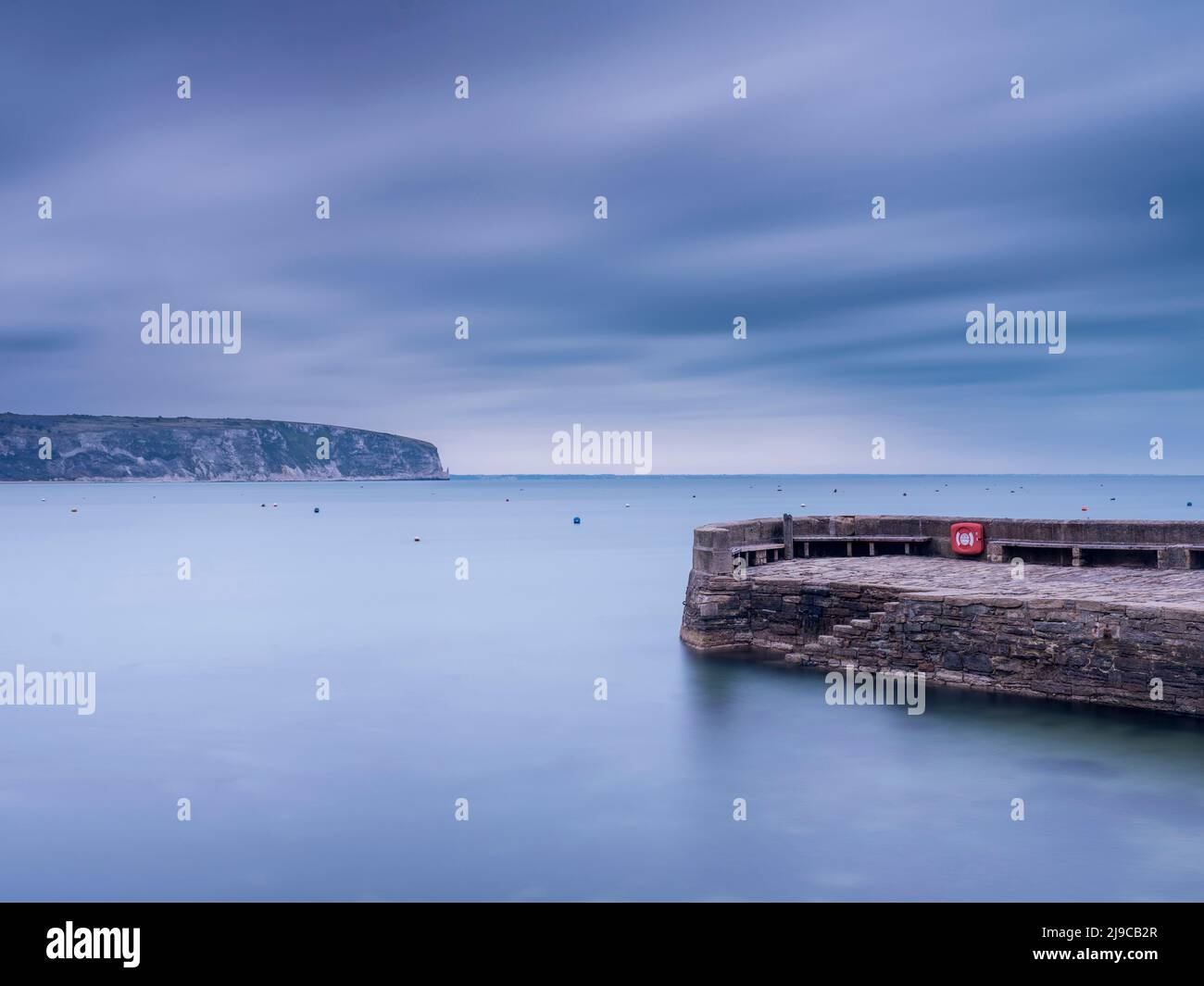 The Old Stone Quay at Swanage on a cloudy morning Stock Photo - Alamy